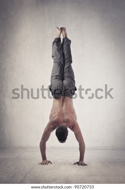 Young Man Doing Handstand Stock Photo (Edit Now) 90720733