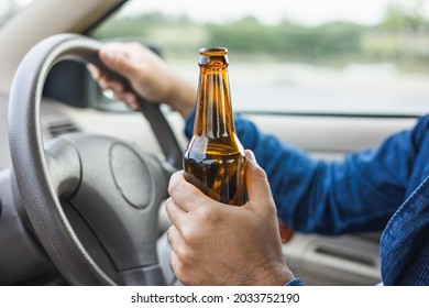 Young Man Drinking Beer While Driving Stock Photo 2033752190 | Shutterstock