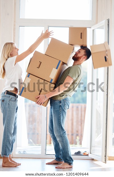 Young Man Falling Stack Cardboard Boxes 库存照片（立即编辑）1201409644