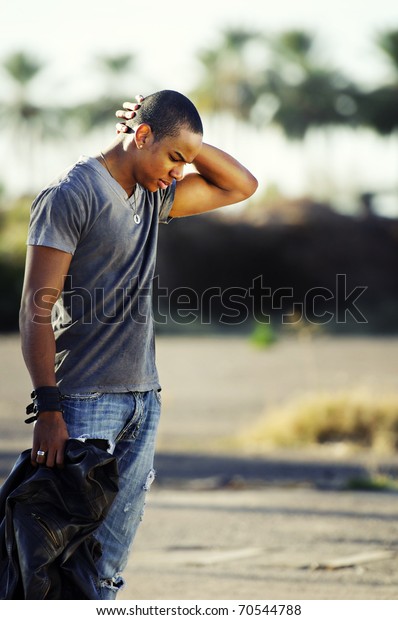 Young Man Head Down Looking Sad Stock Photo (Edit Now) 70544788