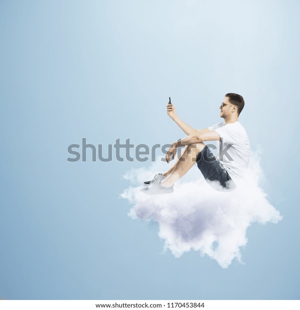 Young Man On Cloud Using Smartphone Stock Photo 1170453844 | Shutterstock