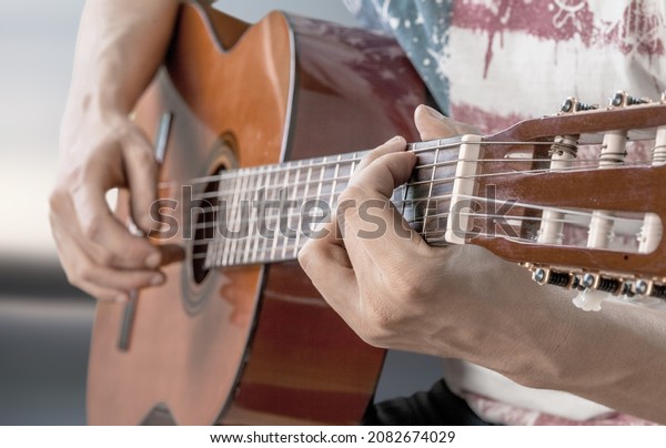 Young Man Playing String Instrument Learning Stock Photo 2082674029 ...