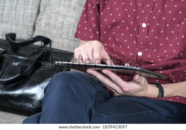 Young Man Sat Down On Sofa Stock Photo 1839453097 | Shutterstock