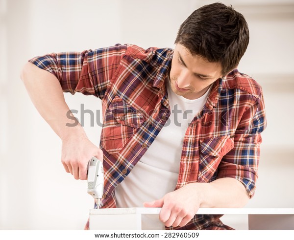 Young Man Using Hand Drill Build Stock Photo 282960509 | Shutterstock