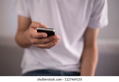 Young Man Using Apps On Touchscreen Stock Photo (Edit Now) 1137788807