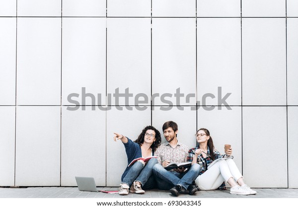 Young People Using Different Gadgets Smiling Stock Photo 693043345 ...