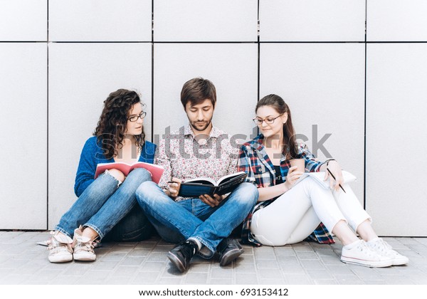 Young People Using Different Gadgets Smiling Stock Photo 693153412 ...