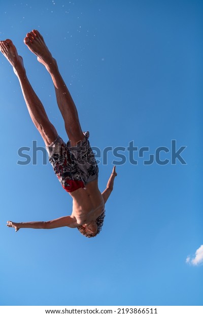 Young Teen Boy Jumping Flying Diving Stock Photo 2193866511 | Shutterstock Young Teen Boy Jumping Flying Diving Stock Photo 2193866511 | Shutterstock