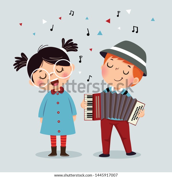 Cute boy playing on a musical instrument accordion and little girl singing.
