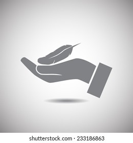 Feather On Hand Vector Icon Stock Vector (Royalty Free) 233186863 ...
