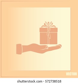 Gift Box Hand Icon Stock Vector (Royalty Free) 572738518 | Shutterstock