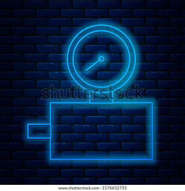 Glowing neon line Gauge scale icon isolated on brick wall background ...