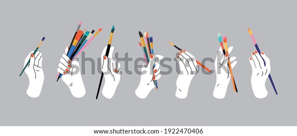 Hand Holding Paintbrushes Hand Drawn Vector Stock Vector (Royalty Free ...