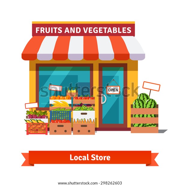 Local fruit and vegetables store building. Groceries crates in front of ...