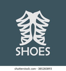 Logo Shoes On Dark Background Vector Stock Vector (Royalty Free) 385283893