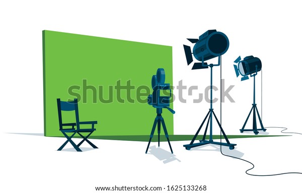 Movie set with green screen, camera, lights and the chair of the director.