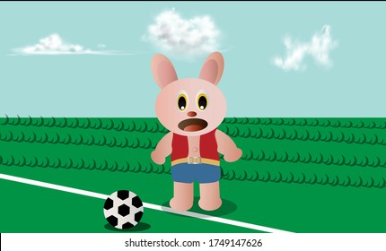 Conejo jugando fútbol en un campo: vector de stock (libre de regalías ...