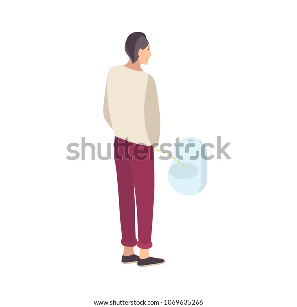 Young guy standing and peeing into urinal isolated on white background ...