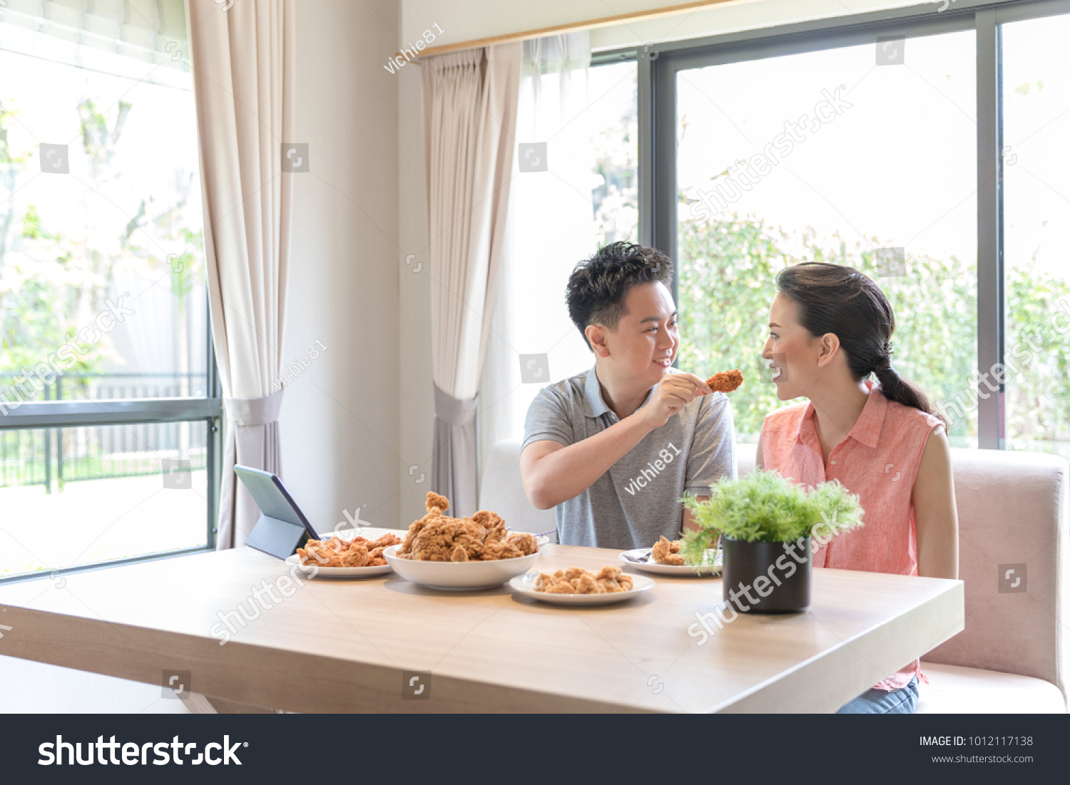 Young Asian Couples Eating Fried Chicken Stock Photo 1012117138 ... Young Asian Couples Eating Fried Chicken Stock Photo 1012117138 ...
