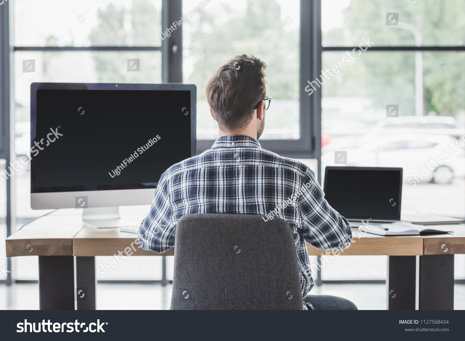 Back View Young Programmer Working Laptop Stock Photo 1127568434 ...