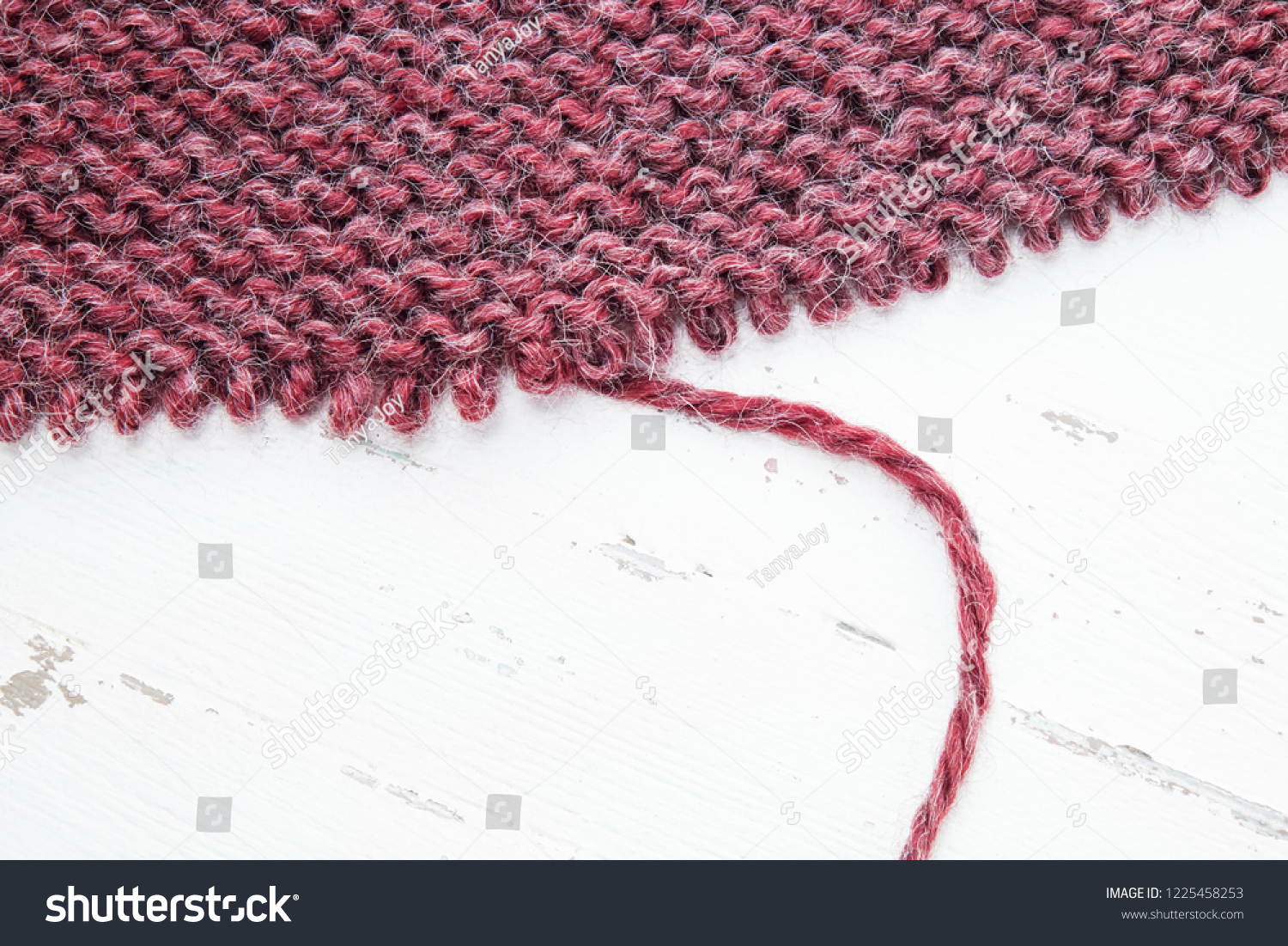 Unravelling Knitted Fabric On White Background Stock Photo 1225458253 ... Unravelling Knitted Fabric On White Background Stock Photo 1225458253 ...
