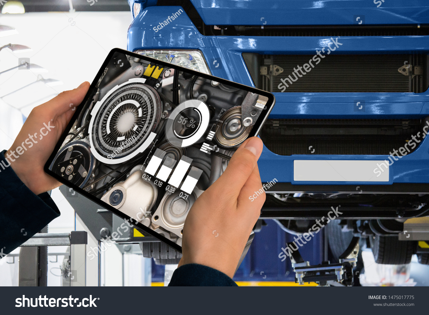 Serviceman Repairing Truck Using Augmented Reality Stock Photo ... Serviceman Repairing Truck Using Augmented Reality Stock Photo ...