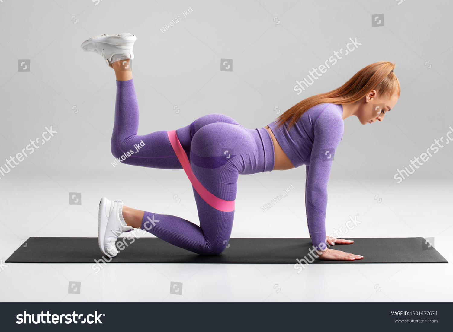 Fitness Woman Doing Kickback Exercise Glutes Stok Fotoğrafı 1901477674 Shutterstock