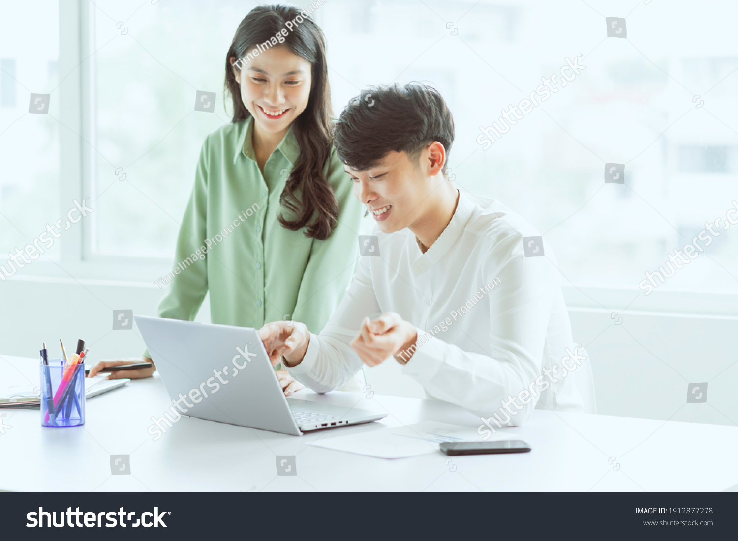 Young Asian Business Couple Working Together Stock Photo 1912877278 ... Young Asian Business Couple Working Together Stock Photo 1912877278 ...
