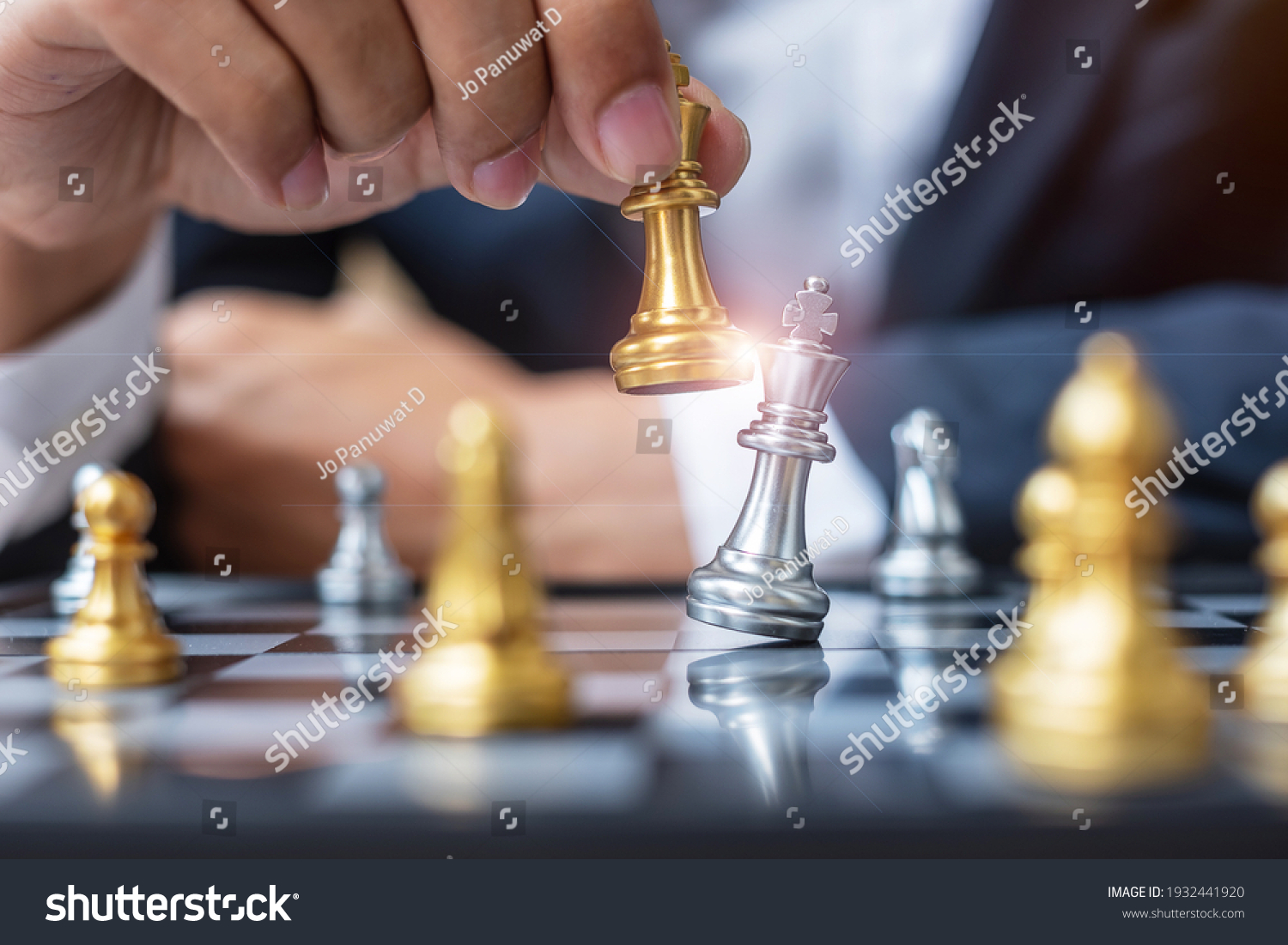 Businessman Hand Moving Gold Chess King Stock Photo 1932441920 ... Businessman Hand Moving Gold Chess King Stock Photo 1932441920 ...
