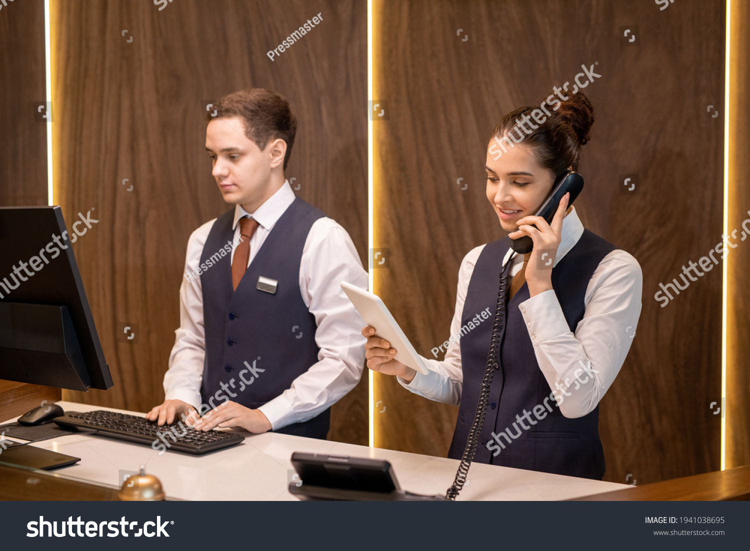 One Two Young Hotel Receptionists Standing Stock Photo 1941038695