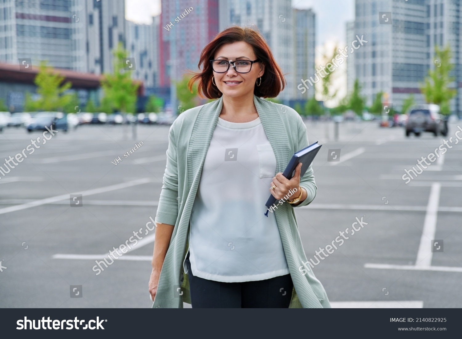 Smiling Successful Mature Business Woman Walking Stock Photo 2140822925 ... Smiling Successful Mature Business Woman Walking Stock Photo 2140822925 ...