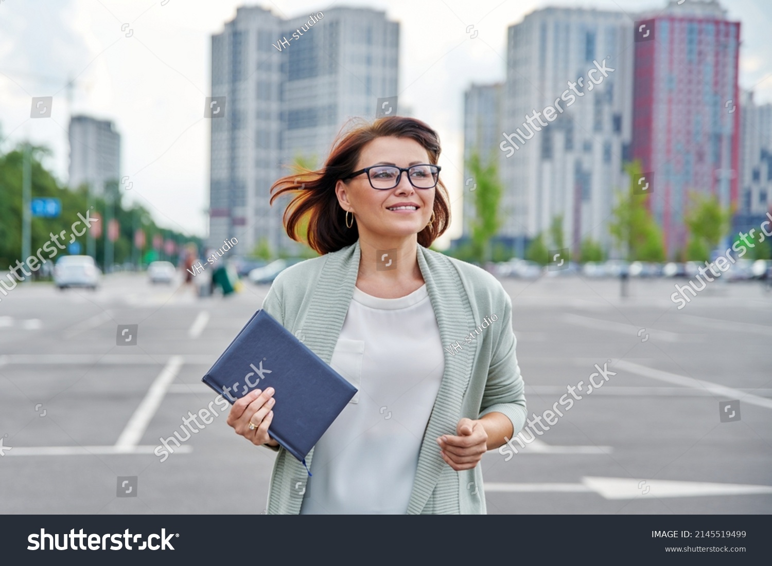 Smiling Successful Mature Business Woman Walking Stock Photo 2145519499 ... Smiling Successful Mature Business Woman Walking Stock Photo 2145519499 ...