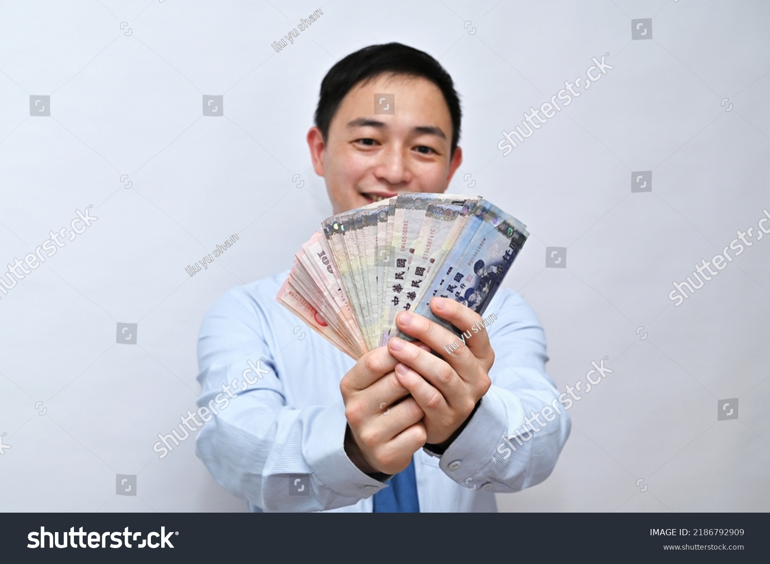 Asian Male Office Worker Holding New Stock Photo 2186792909 | Shutterstock Asian Male Office Worker Holding New Stock Photo 2186792909 | Shutterstock
