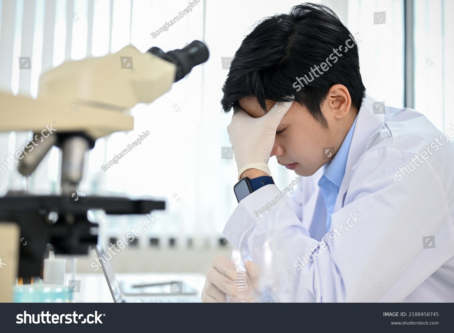Stressed Young Asian Male Scientist Medical Stock Photo 2188458745 ... Stressed Young Asian Male Scientist Medical Stock Photo 2188458745 ...