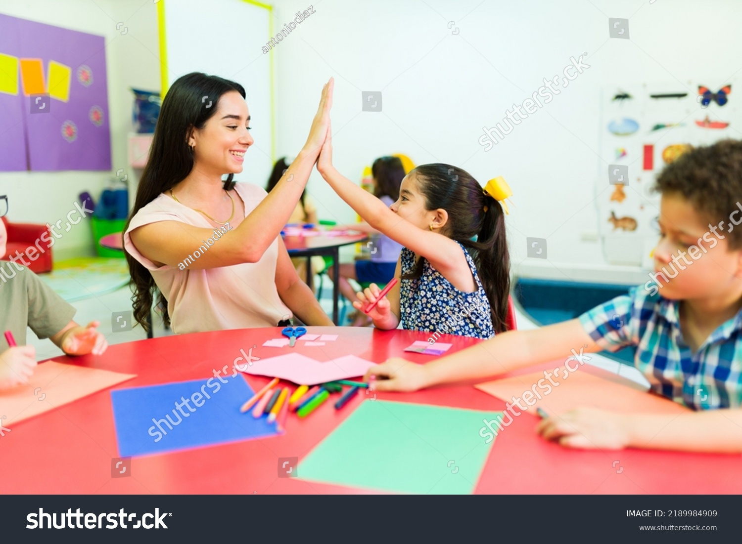 Cheerful Teacher Giving High Five Preschool Stock Photo 2189984909 ... Cheerful Teacher Giving High Five Preschool Stock Photo 2189984909 ...