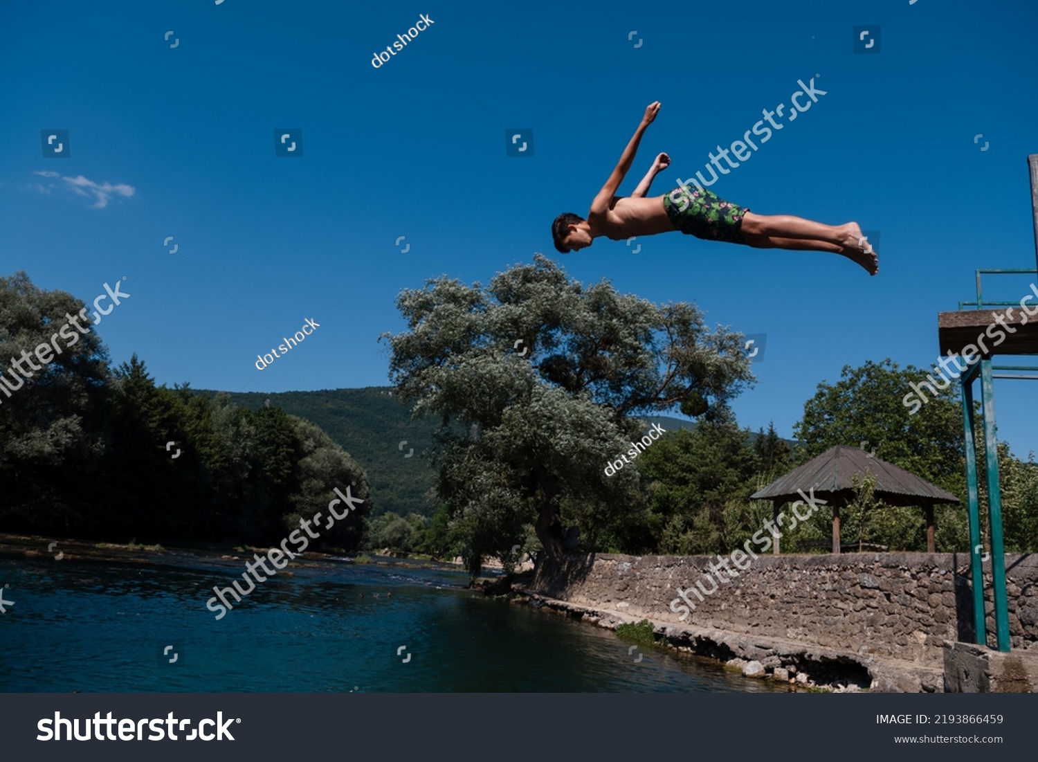 Young Teen Boy Jumping Flying Diving Stock Photo 2193866459 | Shutterstock Young Teen Boy Jumping Flying Diving Stock Photo 2193866459 | Shutterstock