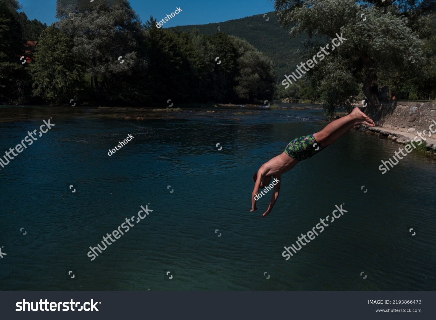 Young Teen Boy Jumping Flying Diving Stock Photo 2193866473 | Shutterstock Young Teen Boy Jumping Flying Diving Stock Photo 2193866473 | Shutterstock