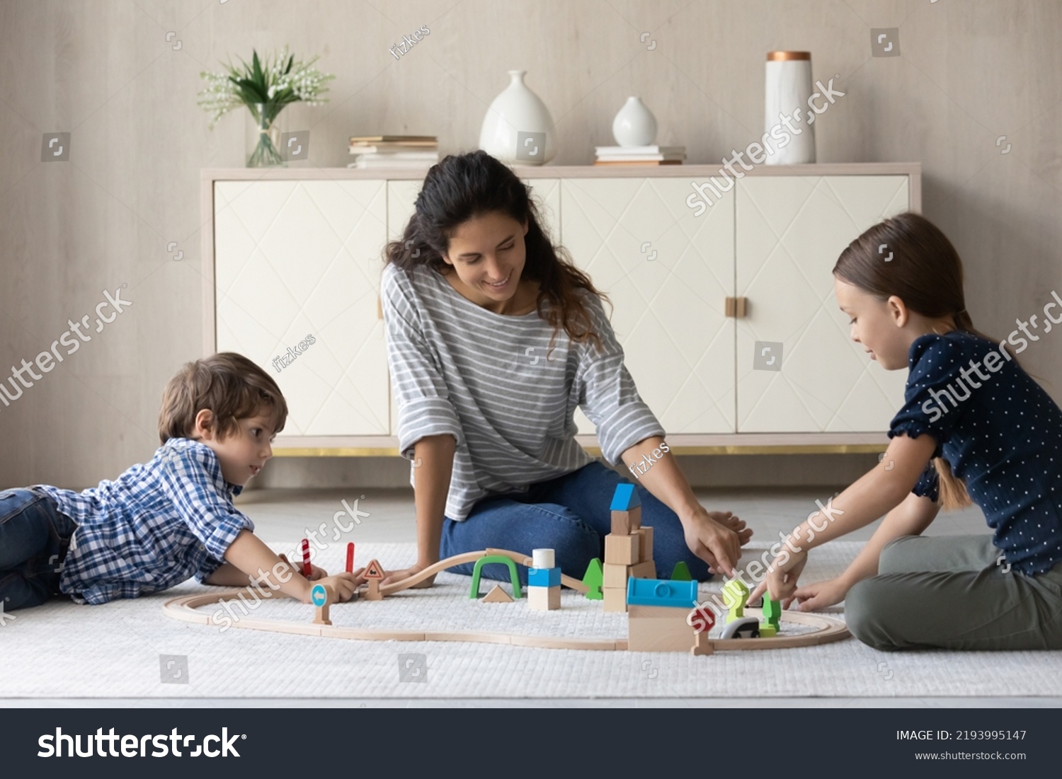 Smiling Beautiful Millennial Hispanic Mother Nanny Stock Photo ... Smiling Beautiful Millennial Hispanic Mother Nanny Stock Photo ...