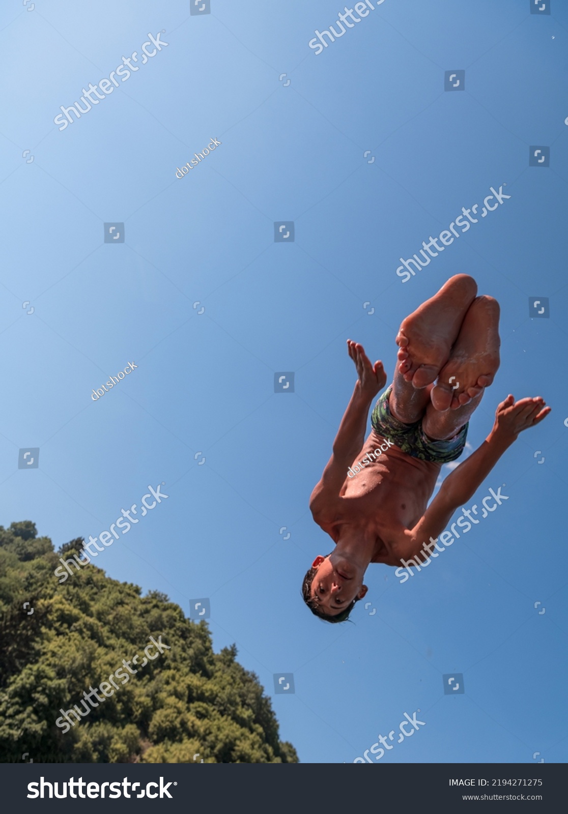 Young Teen Boy Jumping Flying Diving Stock Photo 2194271275 | Shutterstock Young Teen Boy Jumping Flying Diving Stock Photo 2194271275 | Shutterstock