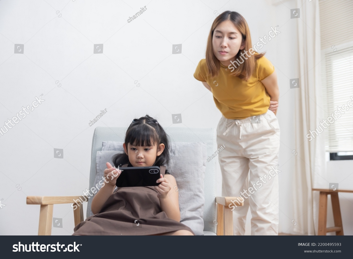 Upset Asian Mother Looking Her Kid Stock Photo 2200495593 | Shutterstock Upset Asian Mother Looking Her Kid Stock Photo 2200495593 | Shutterstock