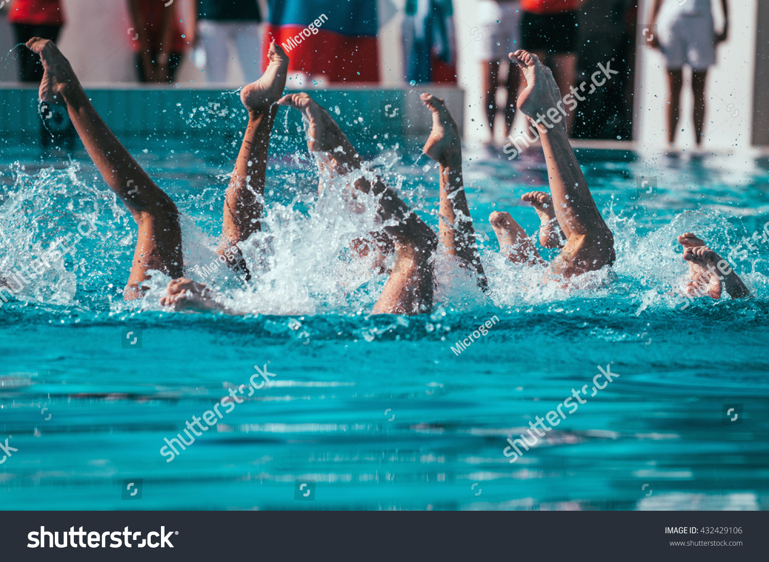 Synchronized Swimmers Performance Legs Outside Water Stock Photo ... Synchronized Swimmers Performance Legs Outside Water Stock Photo ...