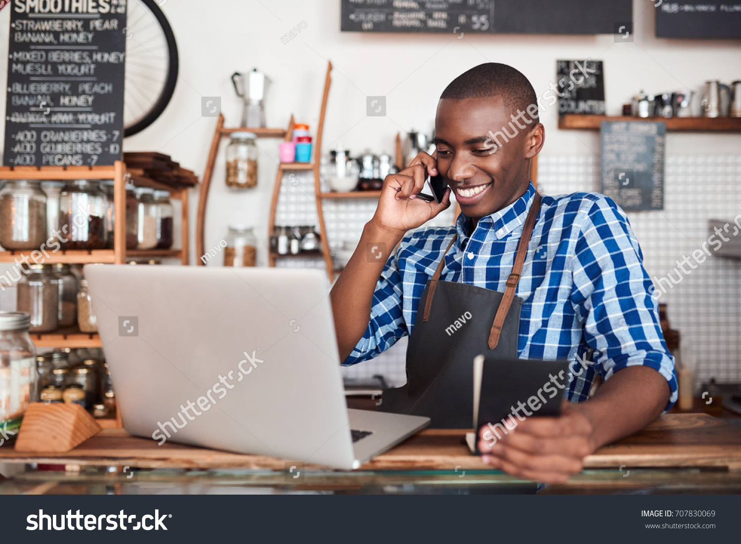 Smiling Young African Entrepreneur Standing Cafe Stock Photo 707830069 ... Smiling Young African Entrepreneur Standing Cafe Stock Photo 707830069 ...