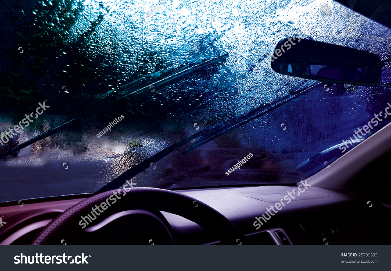 facia of the car and drops on the windshield - Royalty Free Stock Photo ...
