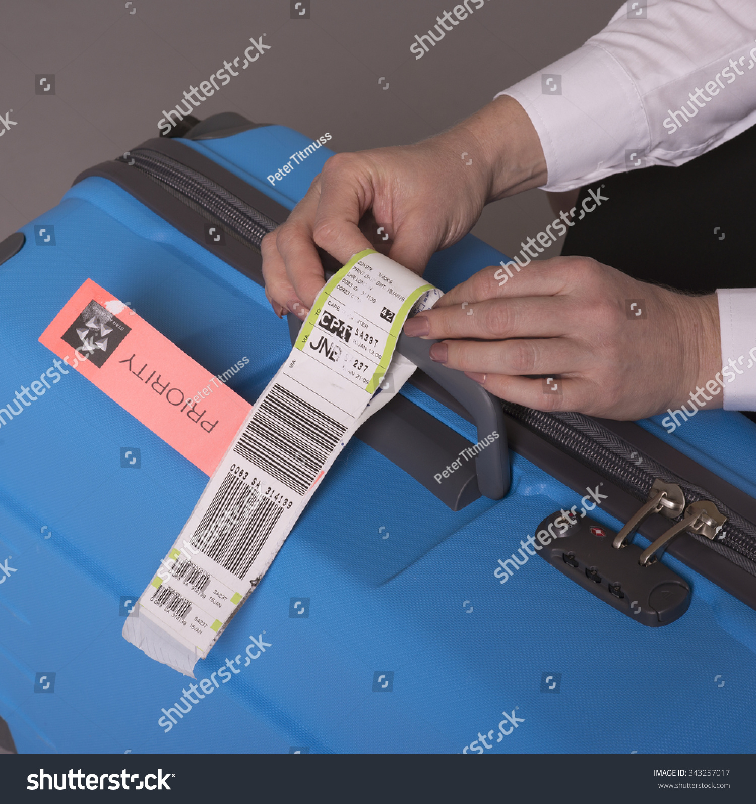 Airline Check Luggage Tag Being Attached Stock Photo 343257017 ... Airline Check Luggage Tag Being Attached Stock Photo 343257017 ...