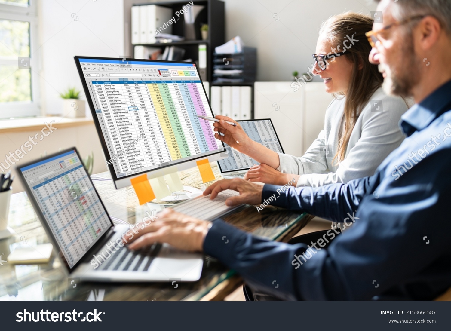 Analyst Employee Working On Spreadsheet Using Stock Photo 2153664587 ...