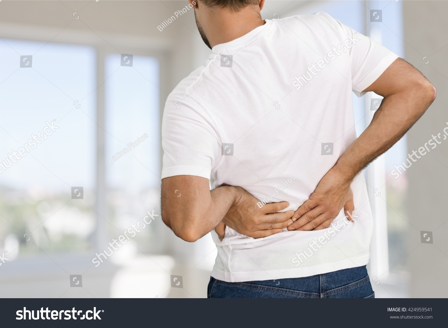 Backache. Stock Photo 424959541 : Shutterstock