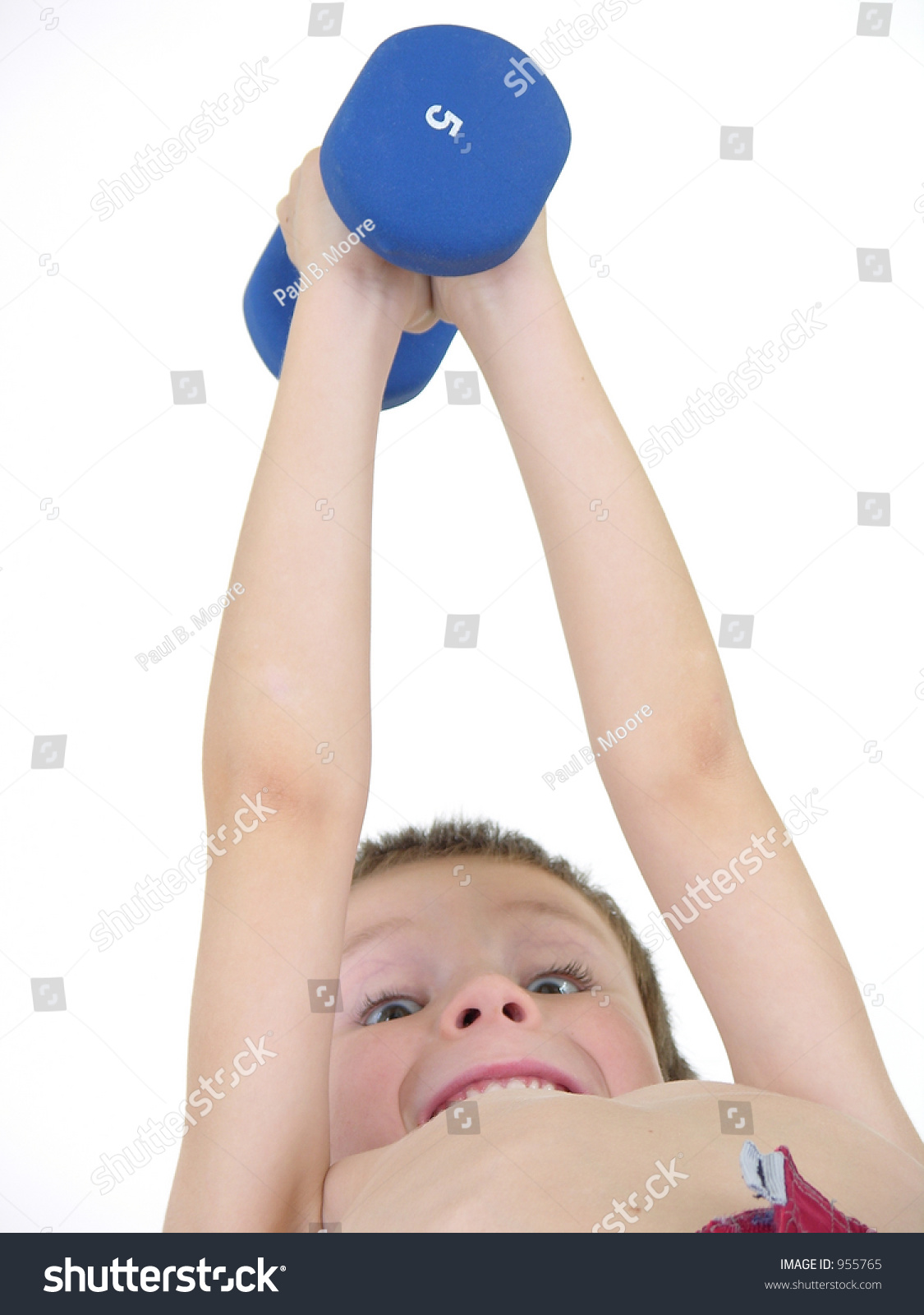 Boy Lifting Weights Stock Photo (Edit Now) 955765