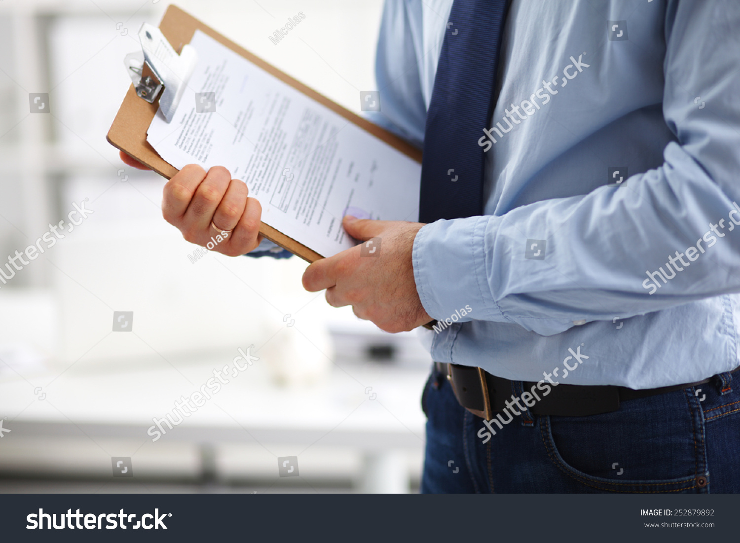 Businessman Hold Clipboard Stock Photo (Edit Now) 252879892 Businessman Hold Clipboard Stock Photo (Edit Now) 252879892