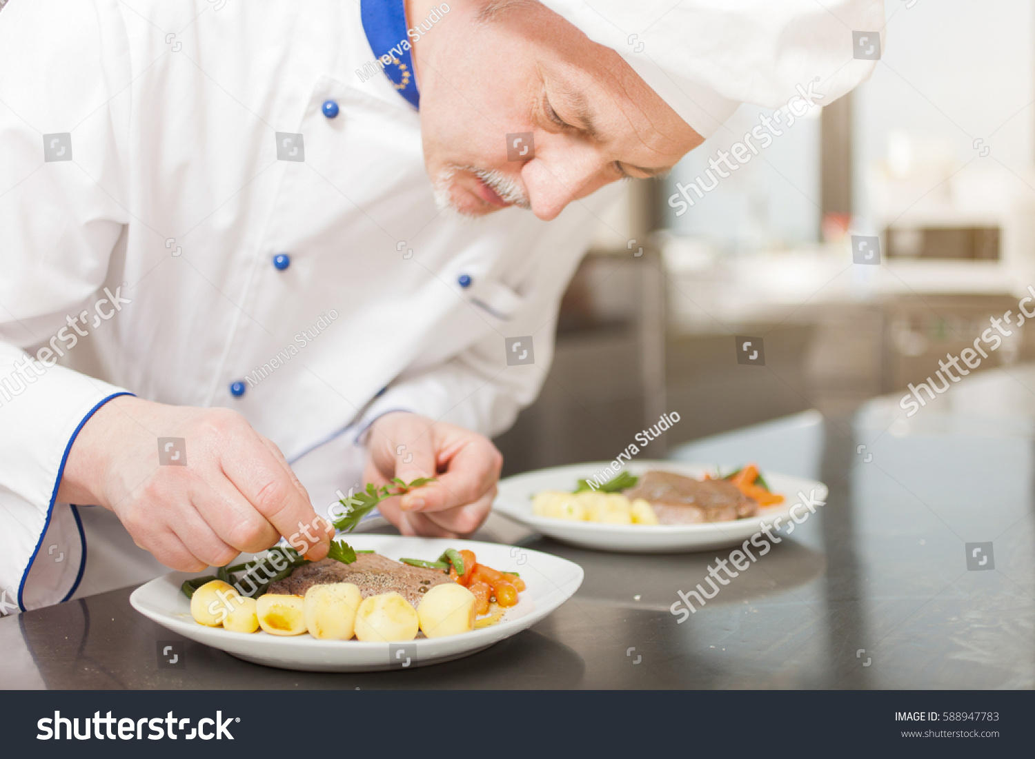 Chef Preparing Dish Restaurant Kitchen Stock Photo 588947783 | Shutterstock Chef Preparing Dish Restaurant Kitchen Stock Photo 588947783 | Shutterstock