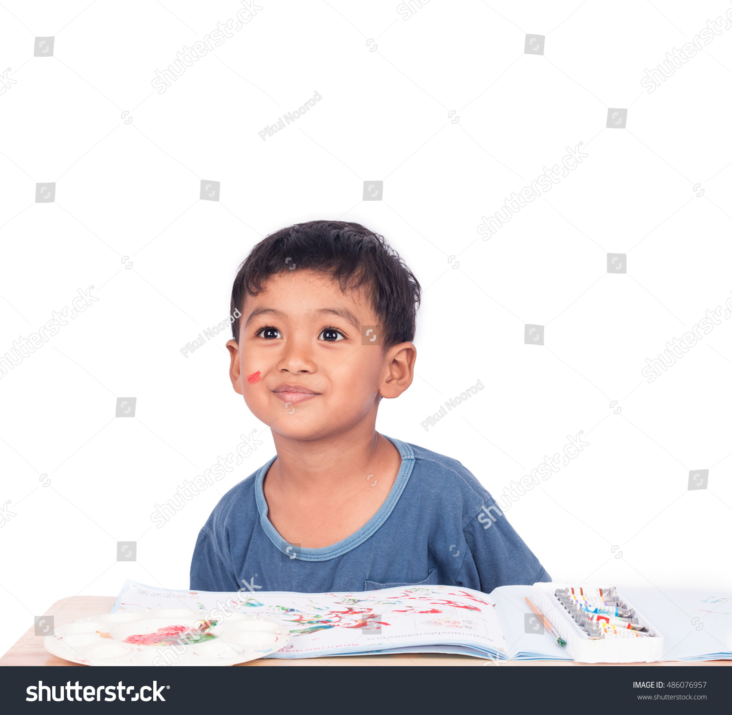 Cute Little Boy Thinking While Doing Stock Photo (Edit Now) 486076957
